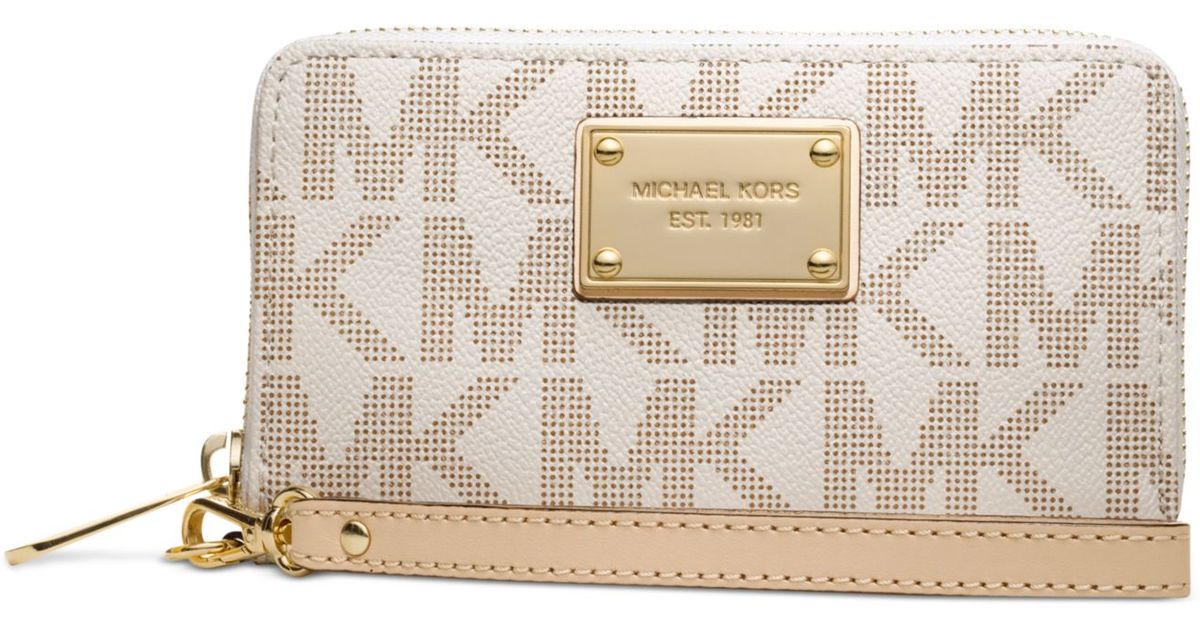 Michael kors Michael Jet Set Large Multi Function Phone Case in White ...