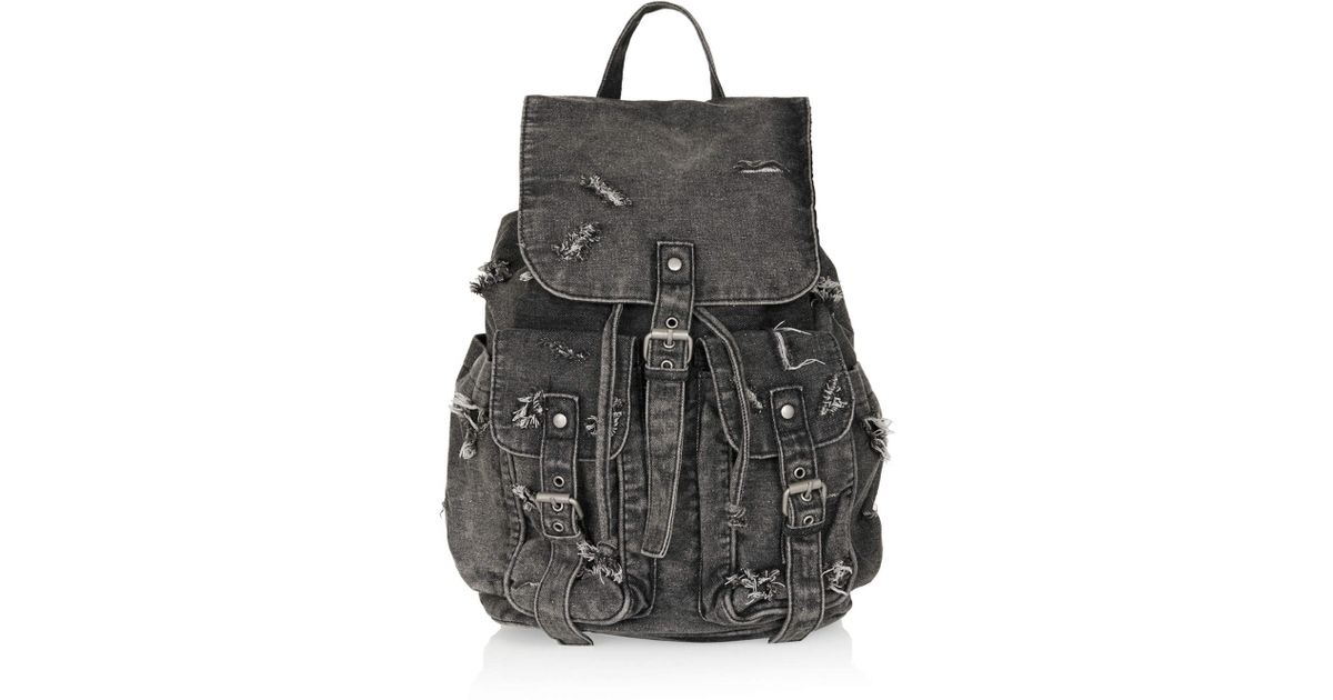 Lyst - Topshop Ripped Denim Backpack in Black